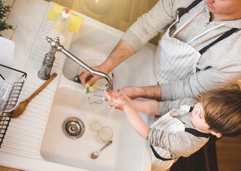 Dad and Son Doing the Washing Up in Kitchen Stock Image - Image of ...