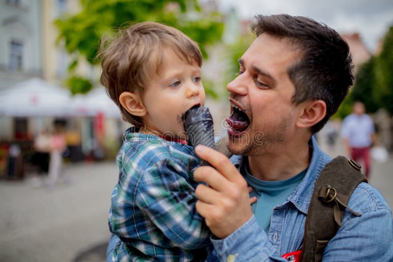 Dad and Son Have a Fun with Black Ice-cream Stock Image - Image of baby ...