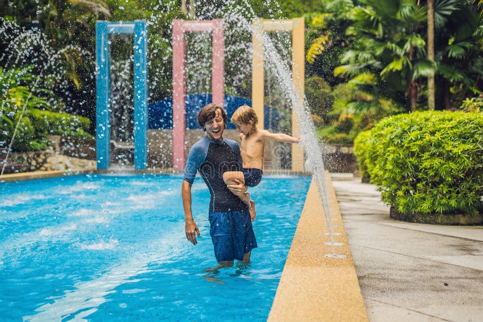 Dad and Son Have Fun in the Pool Stock Photo - Image of lifestyle ...