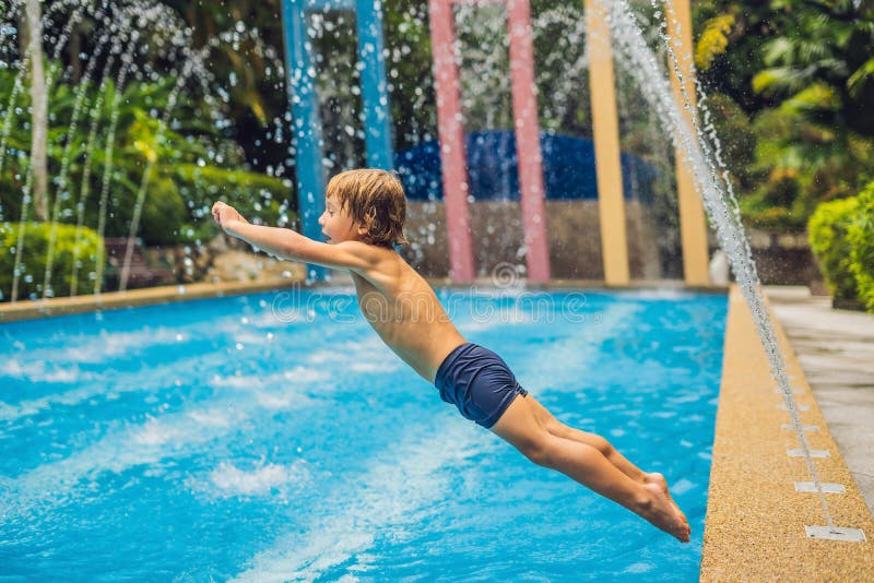 Dad and Son Have Fun in the Pool Stock Image - Image of blue, active ...
