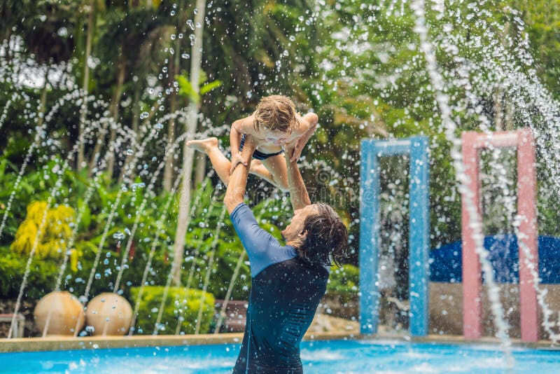 Dad and Son Have Fun in the Pool Stock Photo - Image of father, person ...