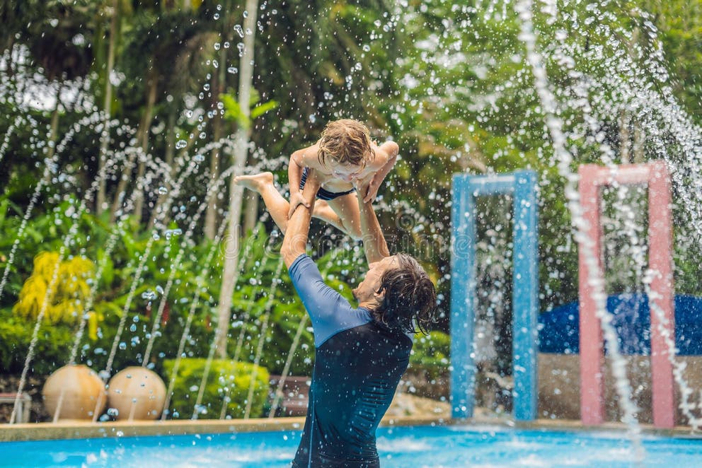Dad and Son Have Fun in the Pool Stock Photo - Image of father, person ...