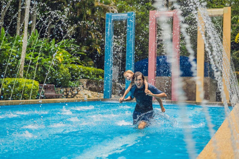 Dad and Son Have Fun in the Pool Stock Image - Image of childhood, life ...