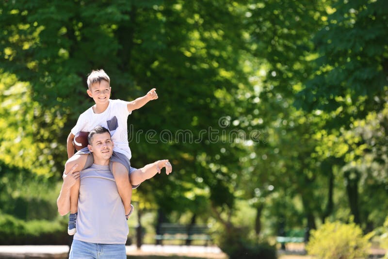 Dad and Son with Rugby Ball Outdoors Stock Photo - Image of enjoy ... Dad and Son with Rugby Ball Outdoors Stock Photo - Image of enjoy ...