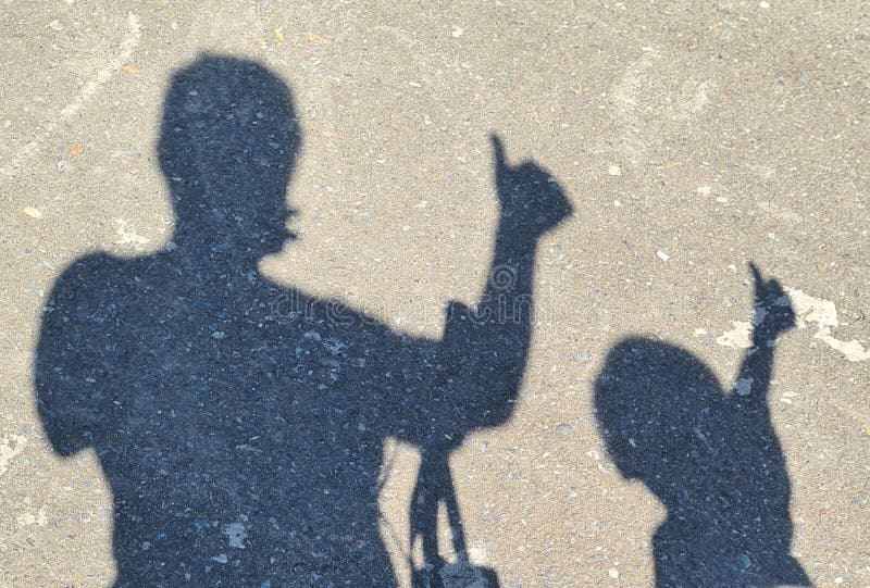 Dad and son shadow stock photo. Image of sunlight, biking - 262785468