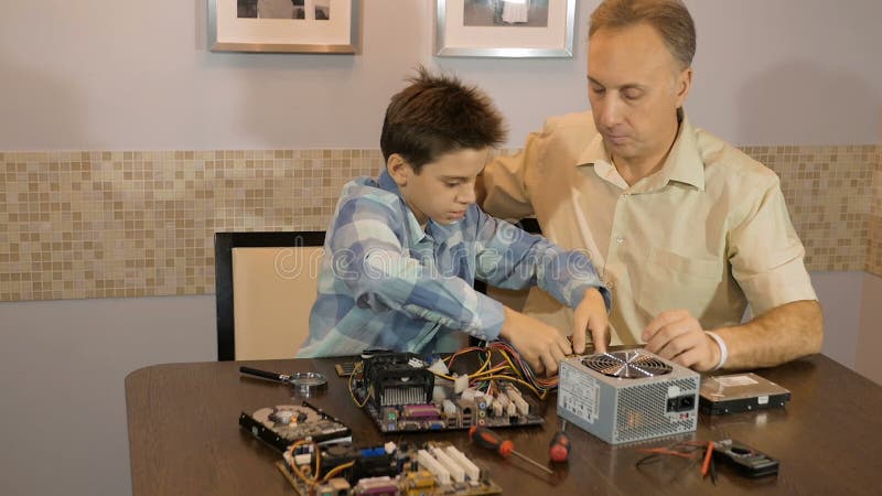 Dad Teaches His Son a Teenager, What`s Inside the Computer. Power ...