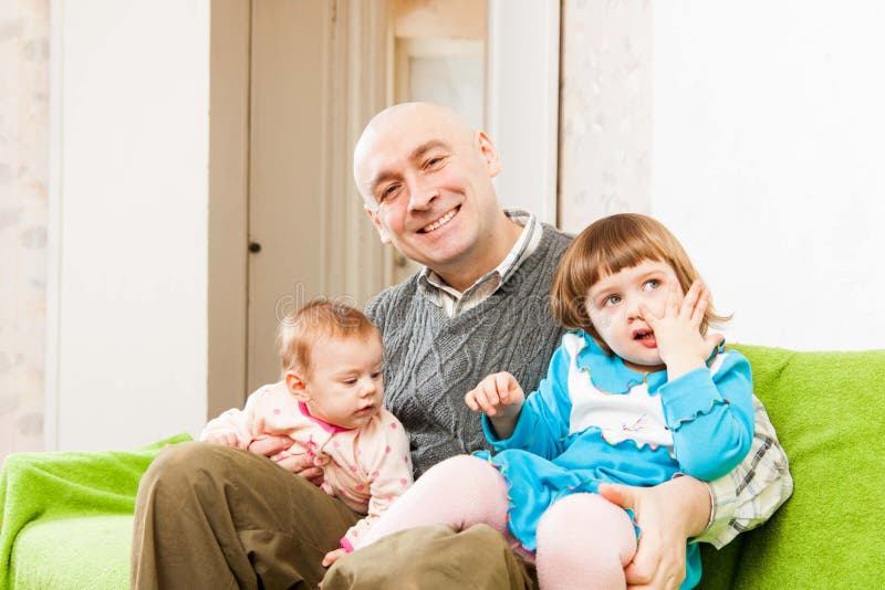 Dad and two daughters stock photo. Image of single, smiling - 34937872