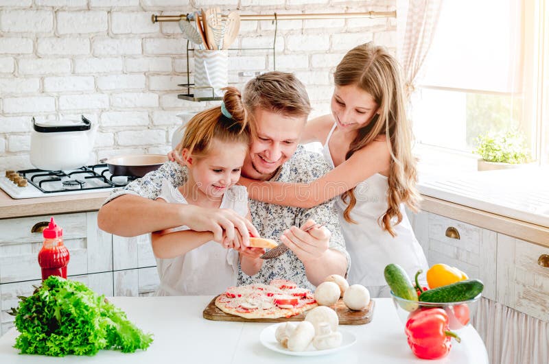 Dad with Daughters Preparing Pizza Stock Image - Image of caucasian ...
