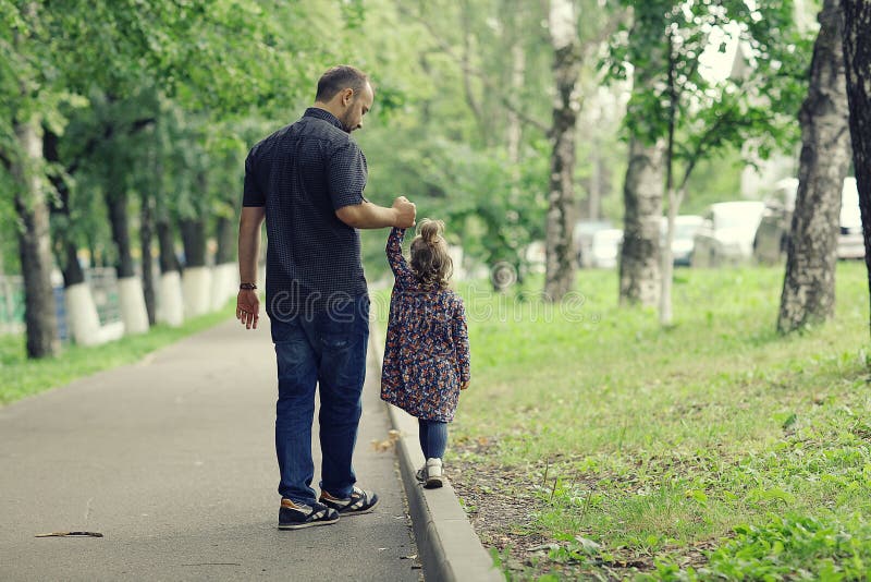 Dad Walks with His Daughter in Park Stock Image - Image of nature ...