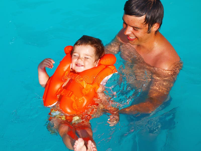 Daddy Learns the Son To Swim Stock Image - Image of healthy, sport ...