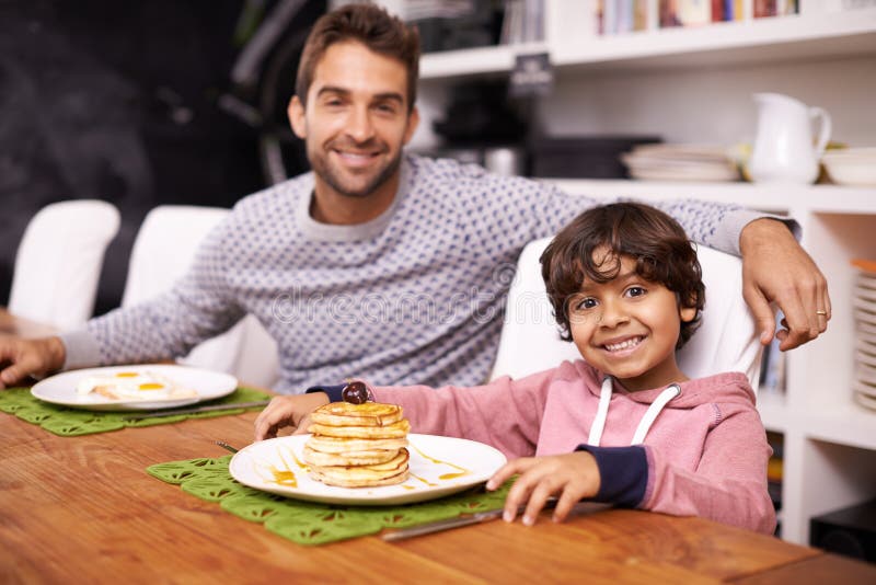 Daddy Makes the Best Pancakes. Portrait of a Father and Son Having ...
