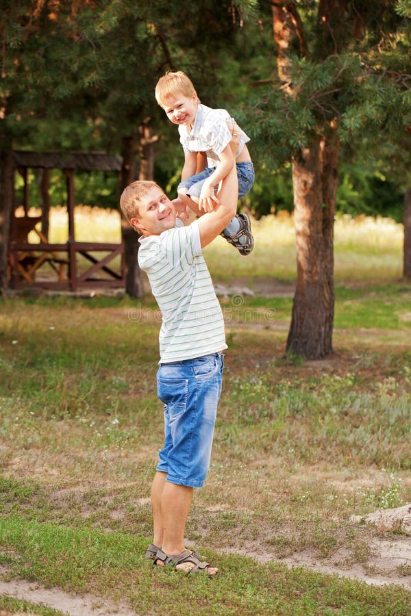 Daddy Raising Up the Child. Stock Image - Image of hand, daddy: 32880009
