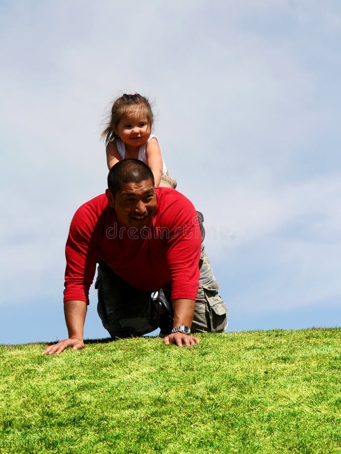 Daddy s Back stock photo. Image of playful, play, green - 1022864