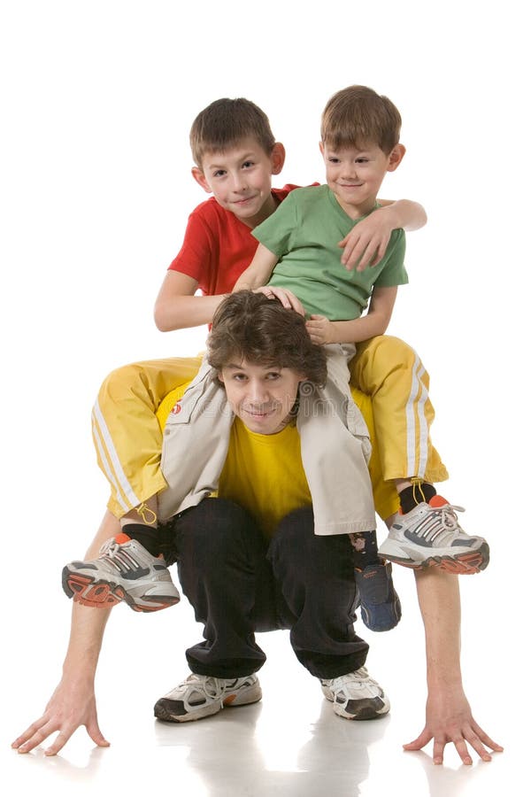 Daddy with two sons stock photo. Image of childhood, happy - 7486736