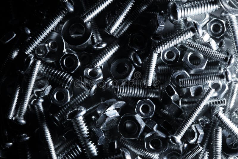 Sfondo di dadi e bulloni fotografia stock. Immagine di acciaio - 34130216