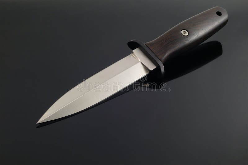 Dagger on black background stock photo. Image of icon - 11062976