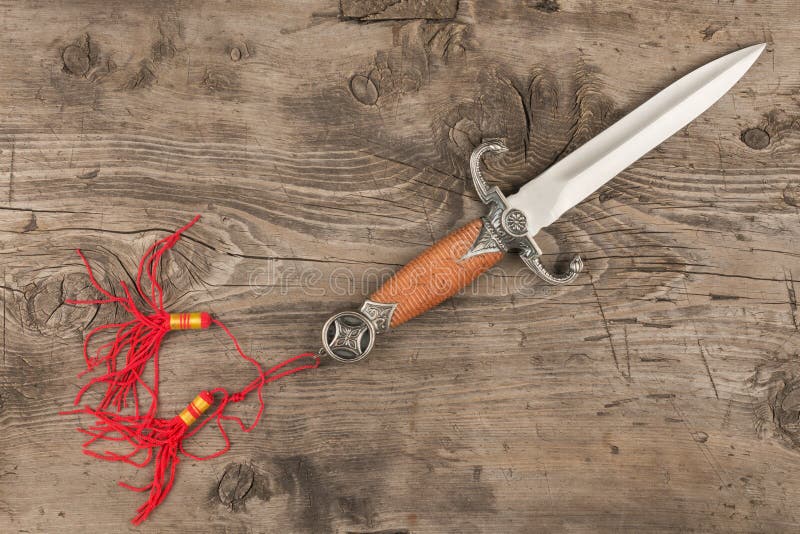 Dagger Lying on a Wooden Surface Stock Photo - Image of nature, hunting ...