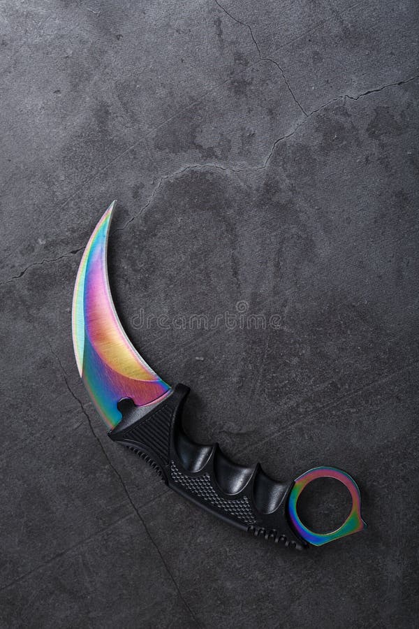 A Dagger with a Steel Blade with a Gradient Color on a Black Background ...