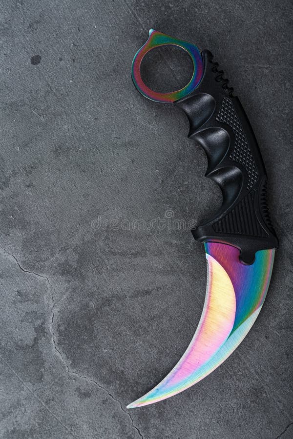 A Dagger with a Steel Blade with a Gradient Color on a Black Background ...