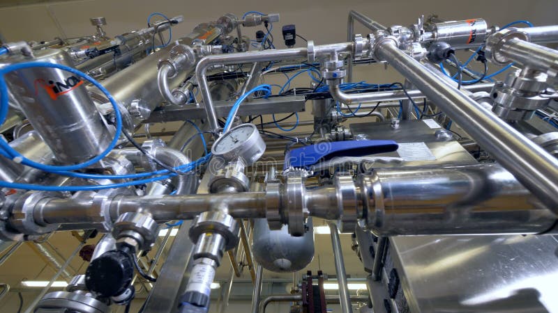 A Dairy Facility Pipework with a Manometer and Plastic Tubes. Stock ...