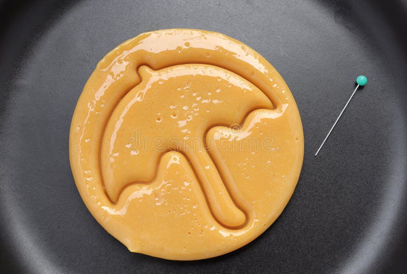 Dalgona Candy or Ppopgi. Sugar Honeycomb Cookie with Umbrella Shape ...