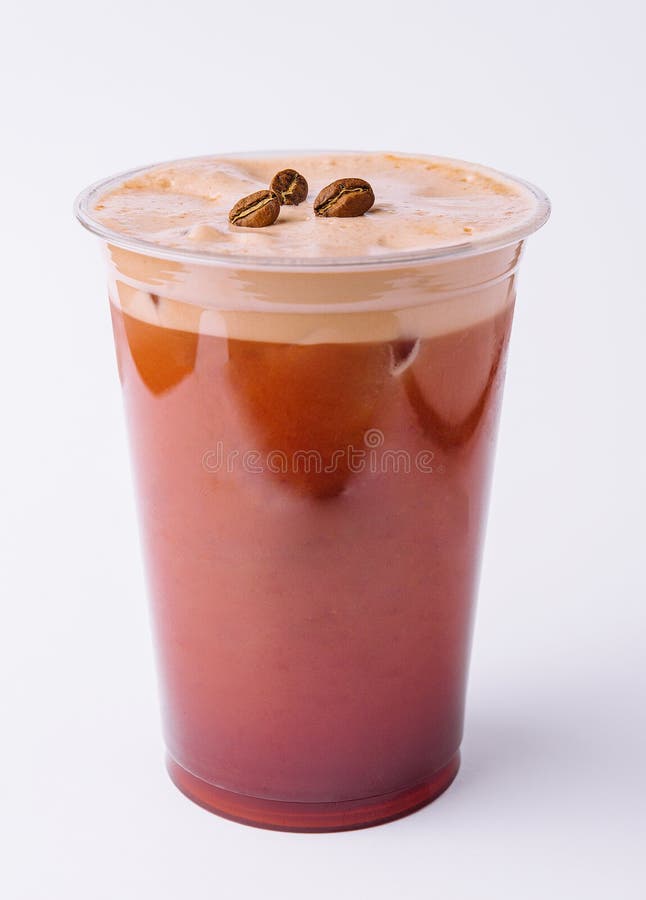 Dalgona Coffee Cream with Milk in Cup with Coffee Beans Stock Image ...