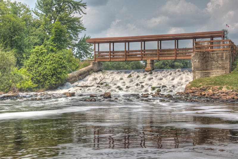 Dam in Falmouth Michigan stock photo. Image of bridge - 56268082