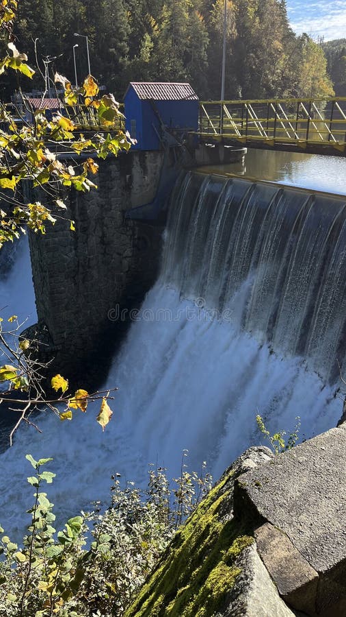 A Dam on a River with Water Falling Down. the Bobr River, Poland Stock ...