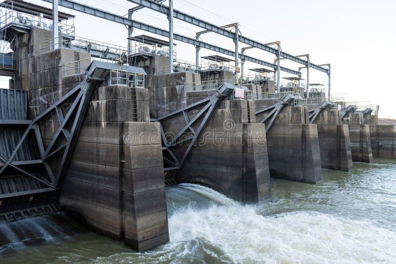 Dam Spillway Gate with Water Flowing through Stock Photo - Image of ...