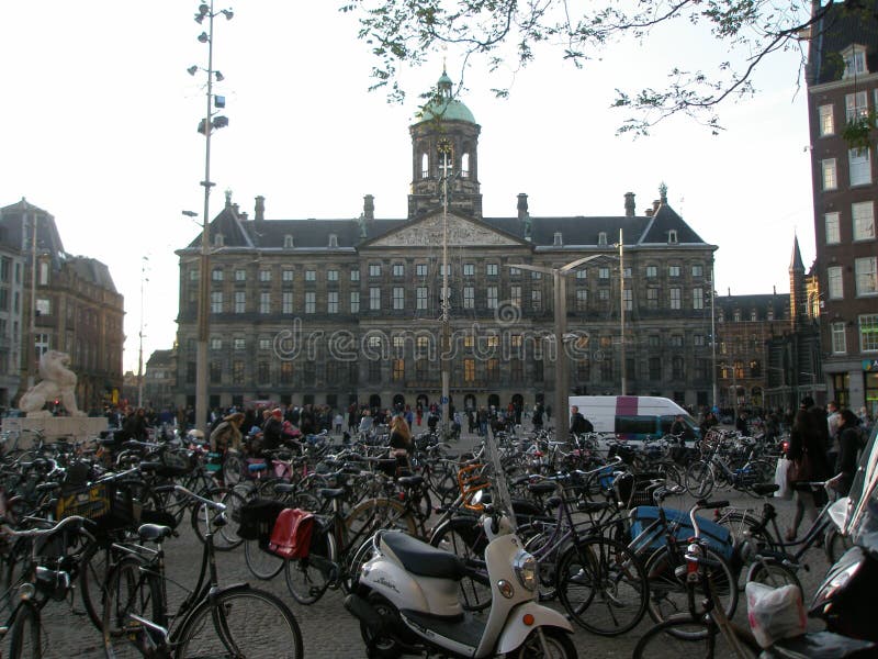 Dam square in Amsterdam editorial stock photo. Image of motorcycle ...