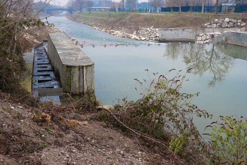 Dam View from Above: Small Rock Dam of a River in a Built-up Area Stock ...
