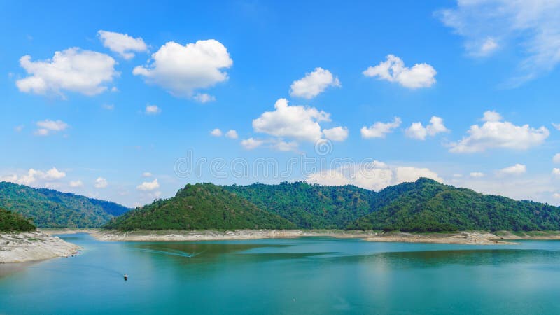 Dam View with Emerald Green Water There are Green Mountains Stock Photo ...
