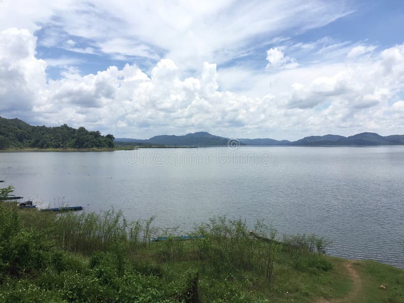 Dam View with White Clouds, Sky and Meadow Stock Photo - Image of ...