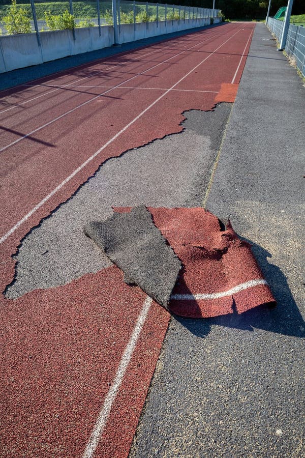 Damage on the Surface of Rubber Sport Track Outdoors Stock Image ...