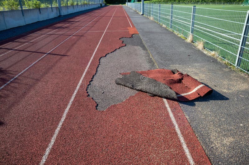 Damage on the Surface of Rubber Sport Track Outdoors Stock Photo ...