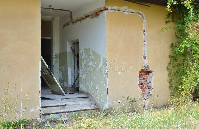 Damage on the Wall of the Building Made by Thieves Stock Image - Image ...