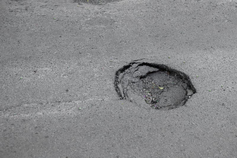 Damaged Asphalt Pavement Road with Potholes Stock Photo - Image of ...