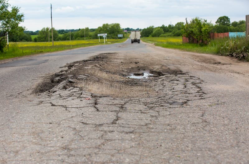 Damaged Asphalt Pavement of Rural Road Stock Image - Image of repair ...