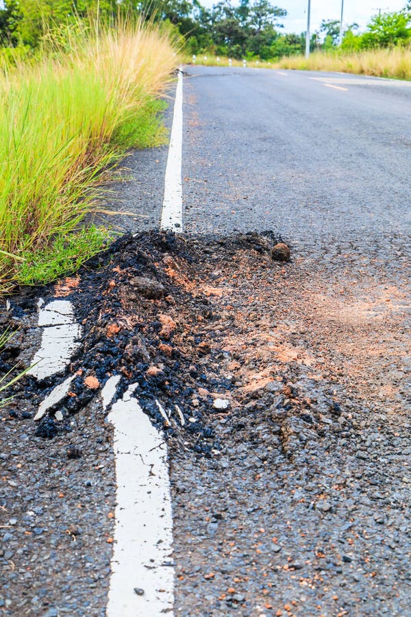 Cracked asphalt road stock image. Image of earth, geology - 33380241