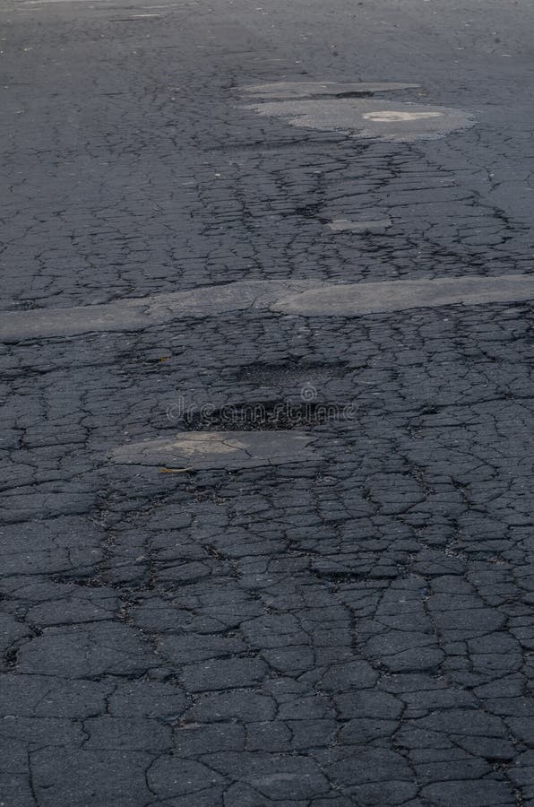 Damaged asphalt road stock photo. Image of unsafe, disrepair - 45712754