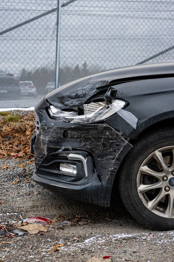 Damaged Black Car with a Crushed Front End after an Accident.. Stock ...