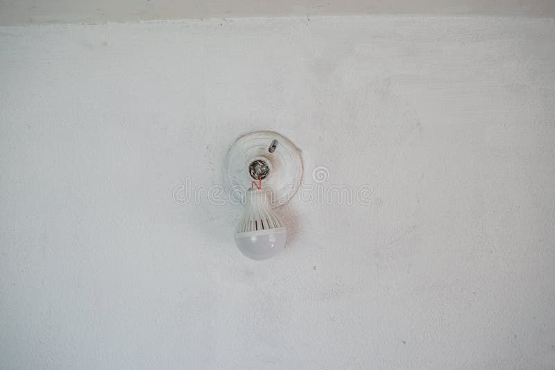 Damaged Bulb Hanging from Socket. Electrical Repair Stock Image - Image ...
