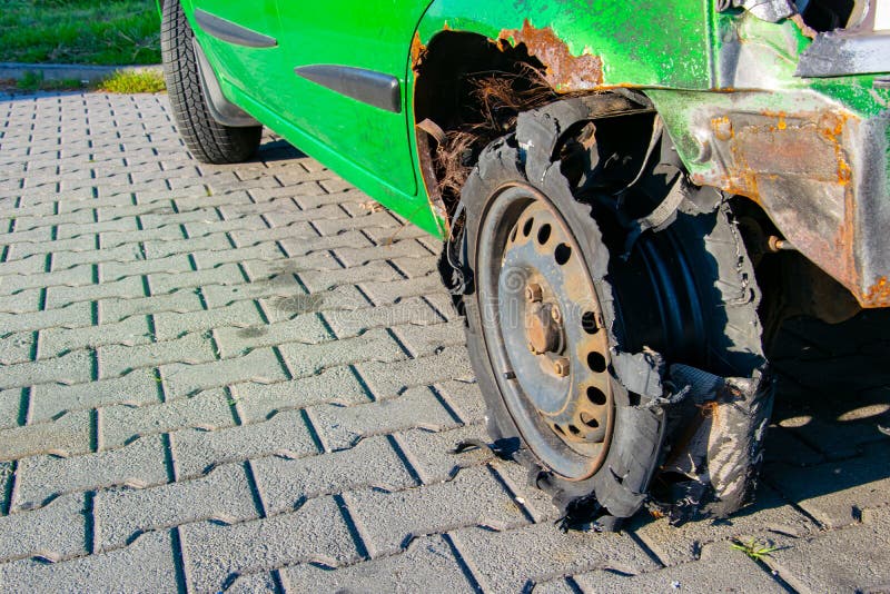Damaged Car Wheel. Flat Tyre Stock Image - Image of closeup, damaged ...