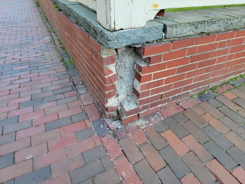 Damaged Corner of Brick Wall or Masonry Broken with Sidewalk Stock ...