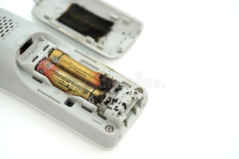 Damaged and Corroded Batteries in Electronic Devices Isolated on White ...