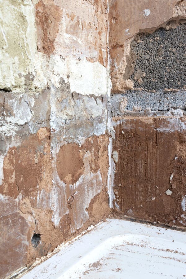 Damaged Damp Plaster Exposing Brick in a Bathroom. Stock Photo - Image ...