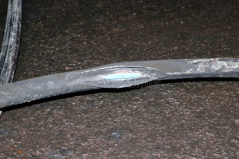 Damaged Electrical Cable on Ground Stock Photo - Image of accident ...