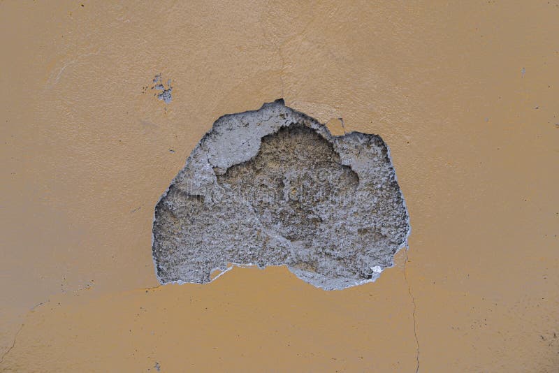 Damaged Facade of a House with Fallen Plaster Stock Photo - Image of ...