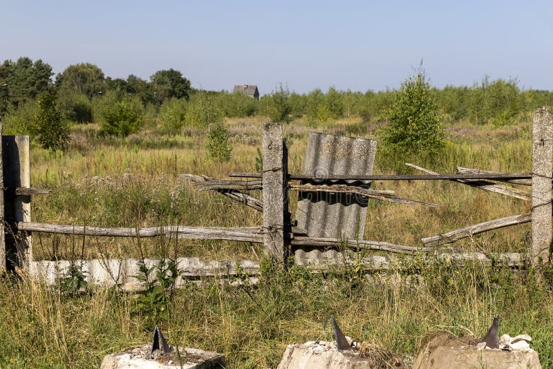 Damaged Fence To Ensure Security Stock Photo - Image of grass, surface ...