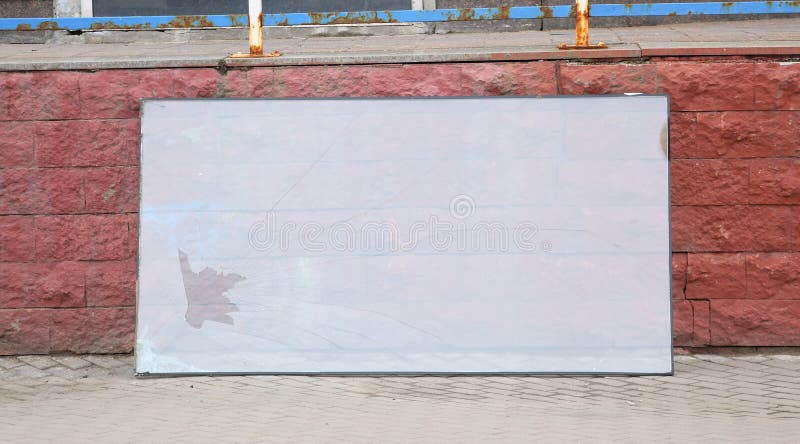 Damaged Glass Display Case is Leaning Against a Red Wall Stock Image ...